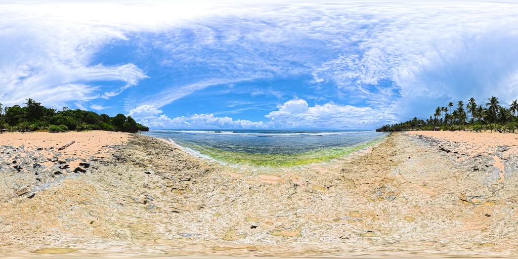 Coral reef edge along sandy beach and shallow sea. Siargao, Philippines ...
